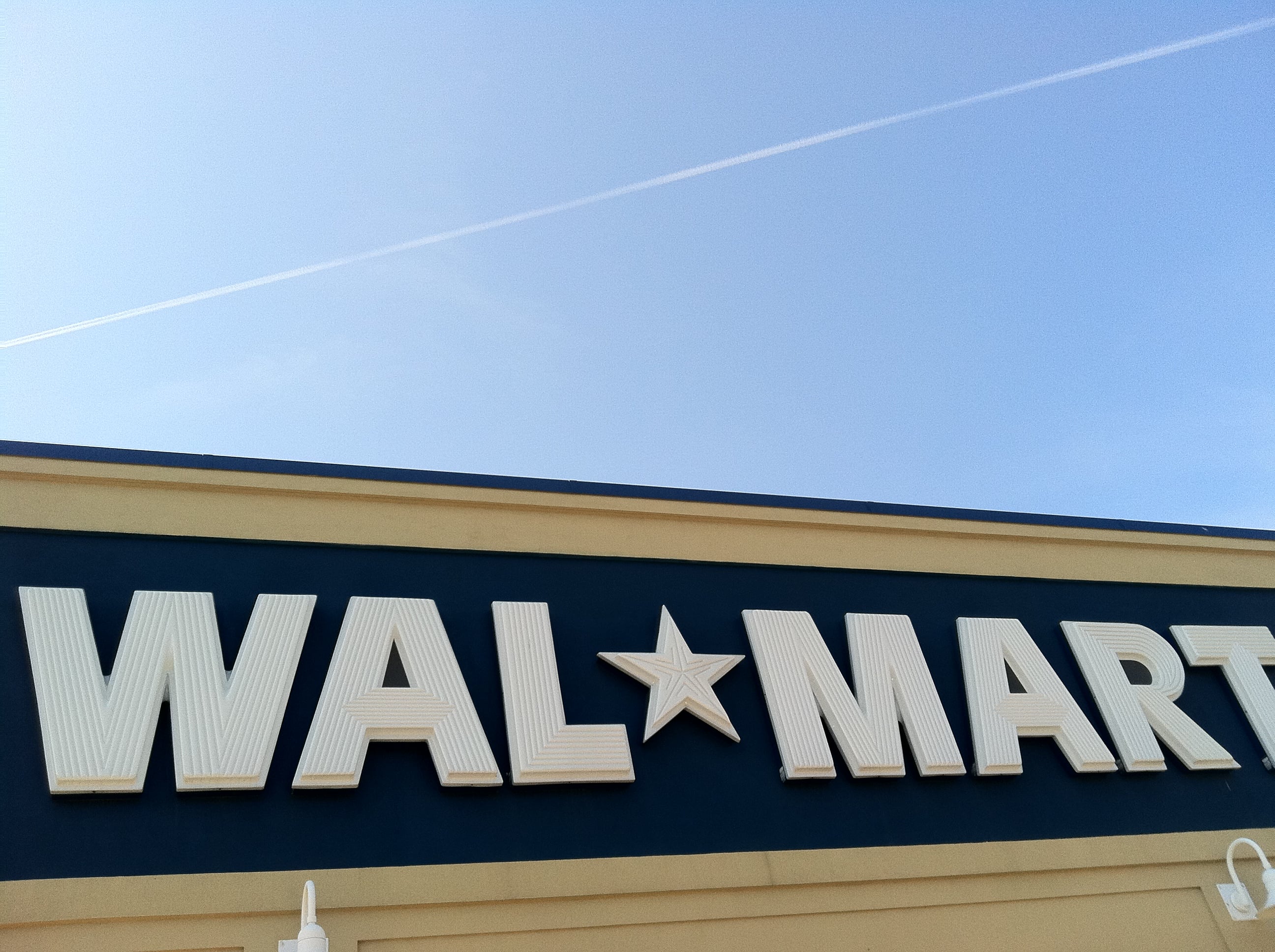 walmart-sign-sky – Institute for Local Self-Reliance